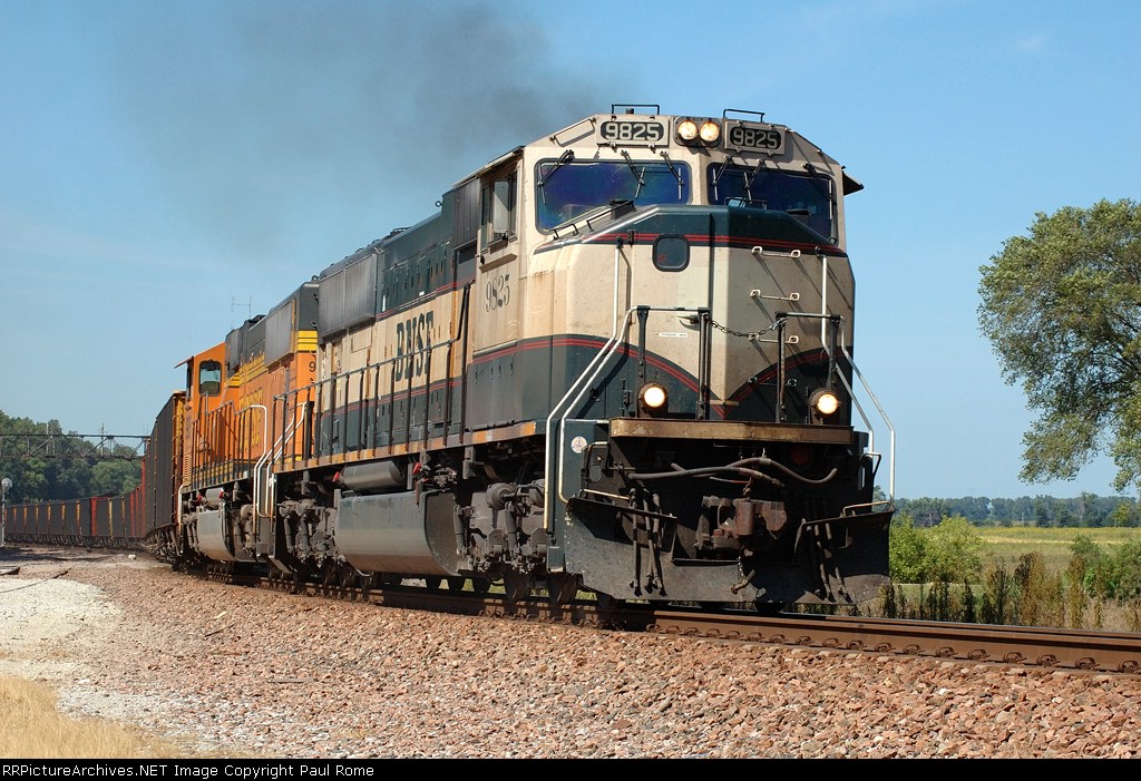 BNSF 9825 leads eastbound coal loads
